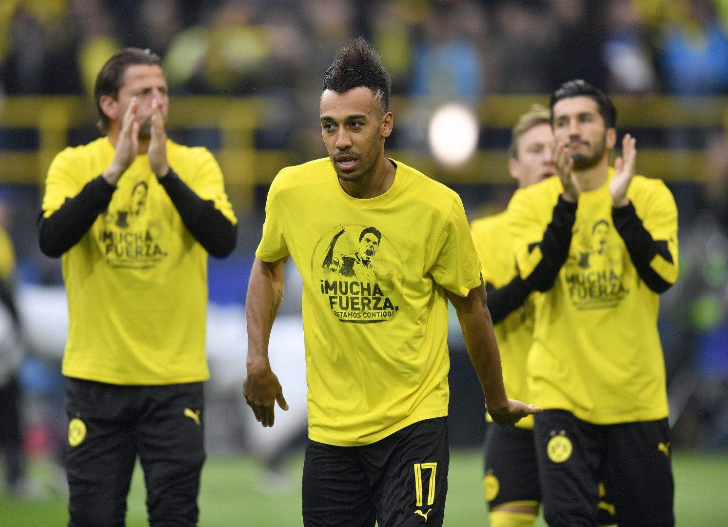 Arrest in bus attack probe as Borussia Dortmund lose rescheduled match ...