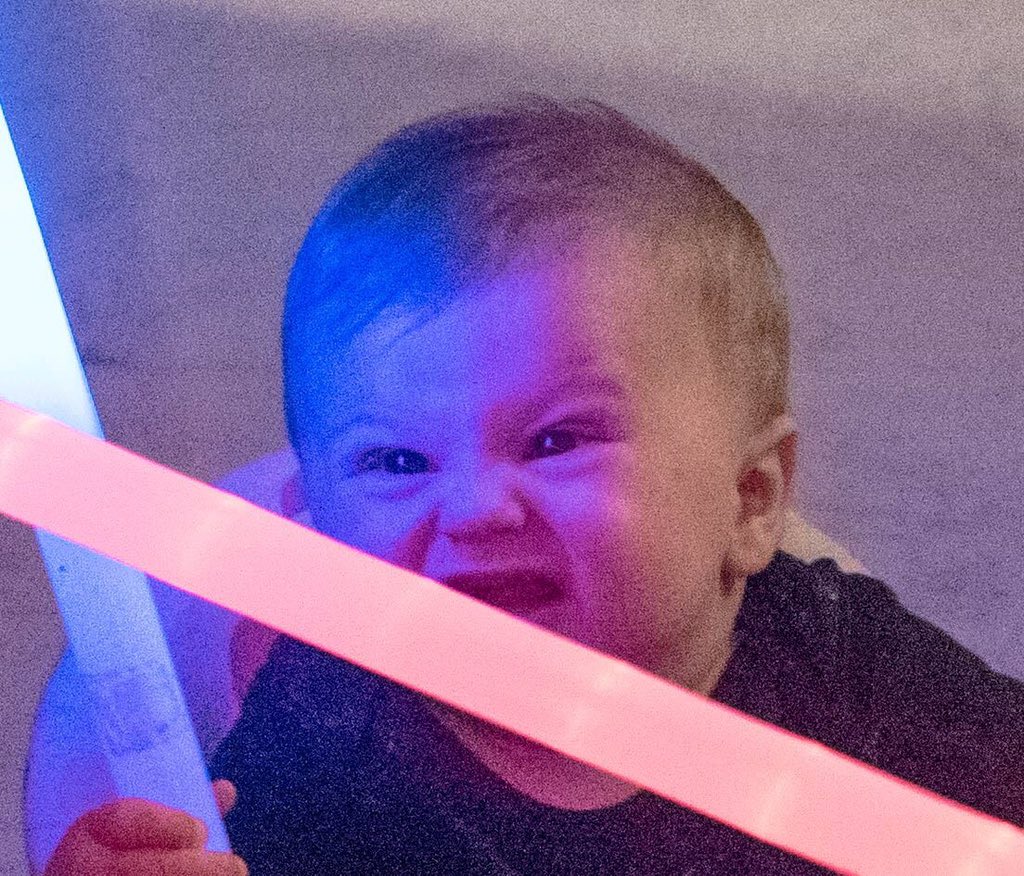 The Force is SO strong with this baby playing with a lightsaber for the ...