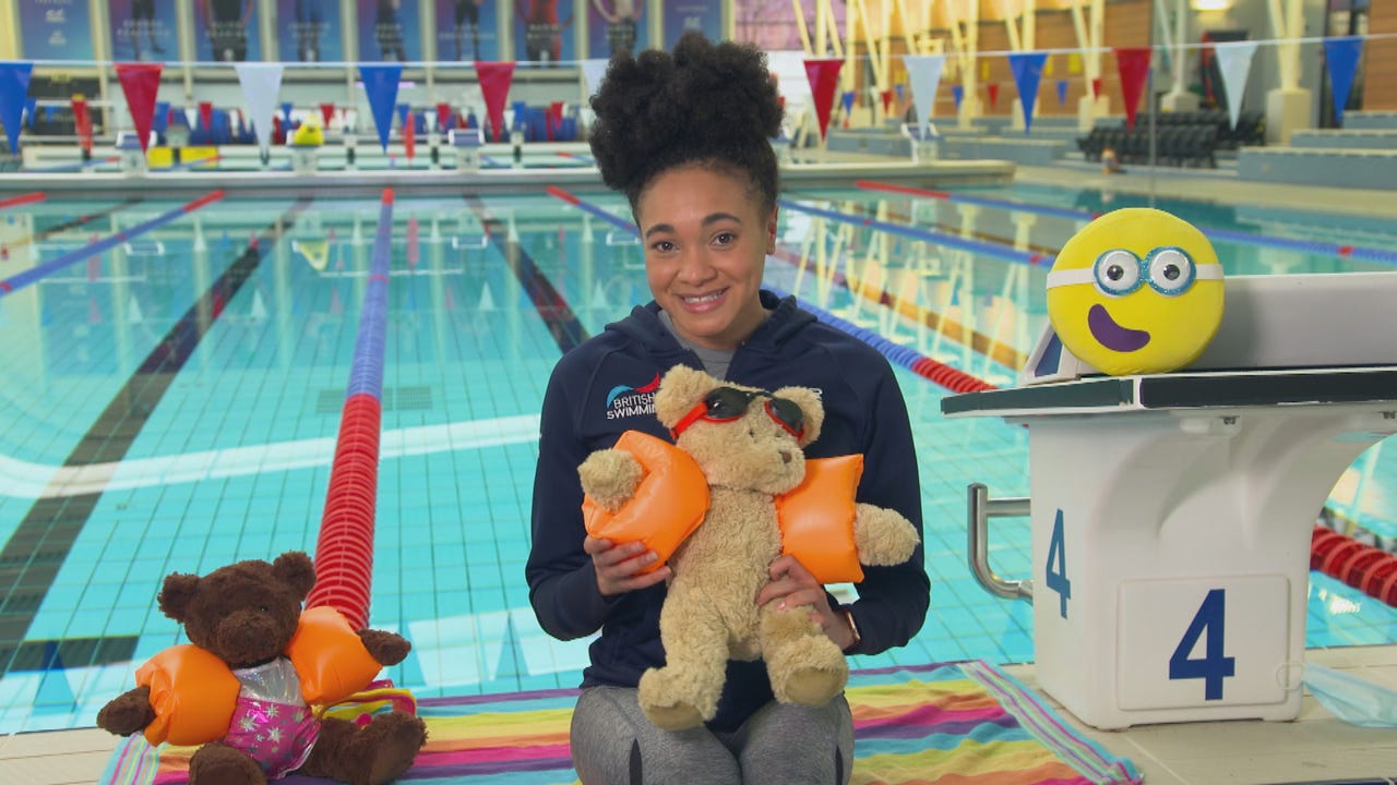 Olympic swimmer Alice Dearing sits poolside for CBeebies Bedtime Story ...