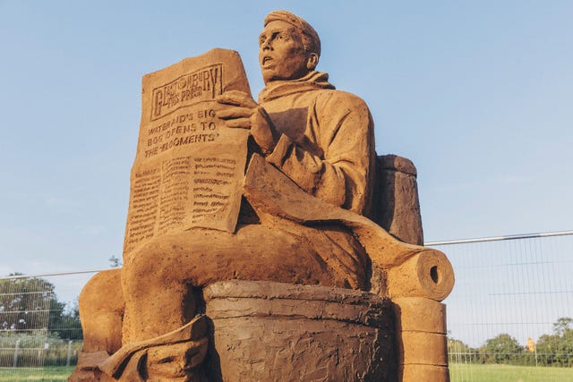 Huge mud toilet sculpture unveiled at Glastonbury to warn against ...
