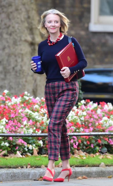 From fluorescent suits to Thatcher bows – Liz Truss’s fashion journey ...