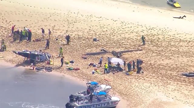 Four passengers killed as helicopters collide over Australian beach | The Scottish Farmer