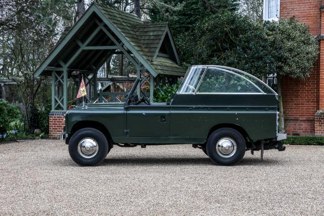 Ceremonial Land Rover used by the late Queen Elizabeth going under the ...
