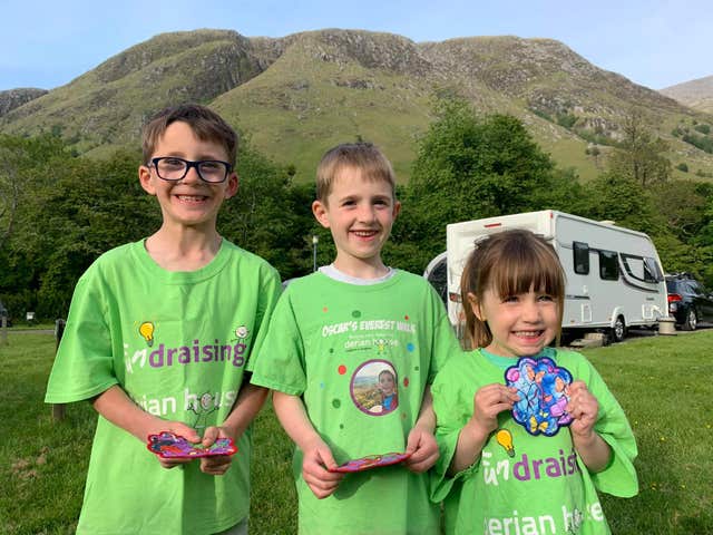 Boy, six, climbs 12 UK mountains ‘to help poorly children go on holiday’