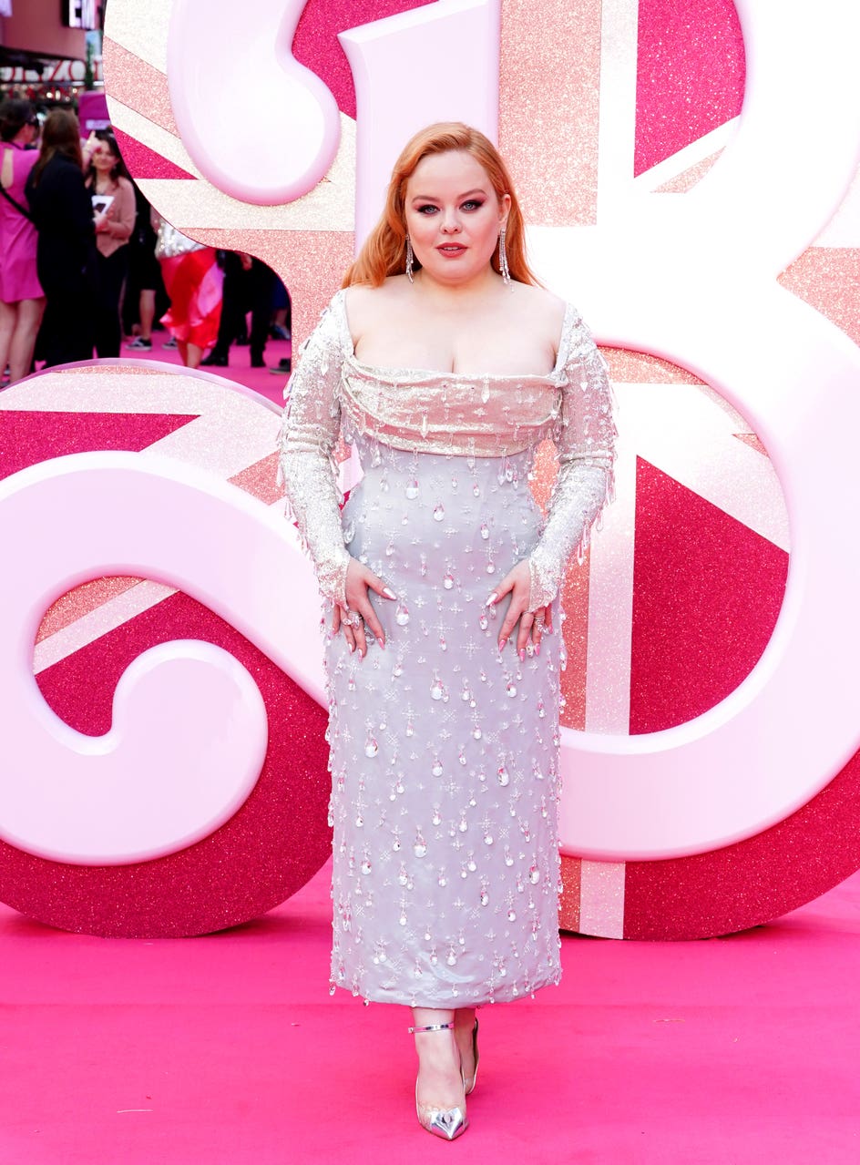 Margot Robbie channels real Barbie doll for star-studded premiere ...