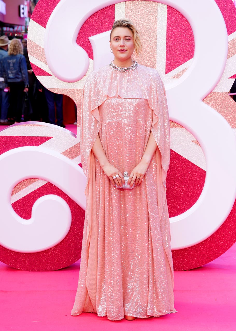 Margot Robbie channels real Barbie doll for star-studded premiere ...