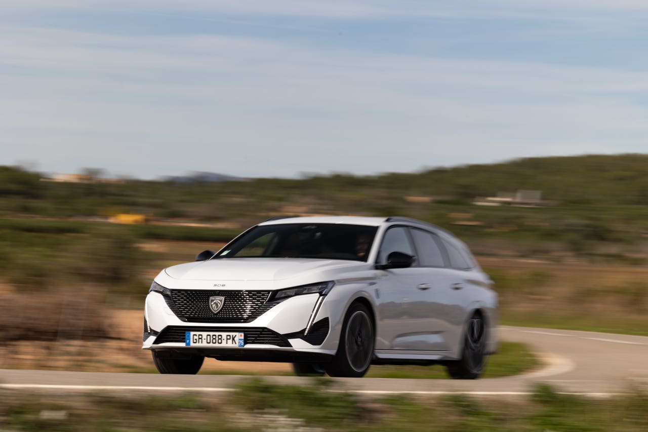 First Drive: Is the new Peugeot e-308 SW an EV with one eye on ...