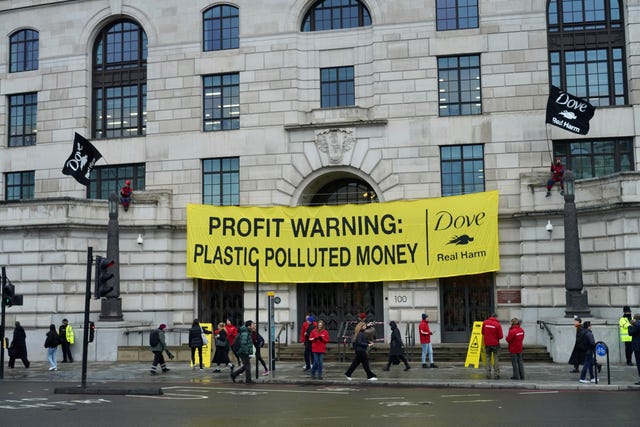 Greenpeace protesters scale Unilever headquarters in plastic pollution ...