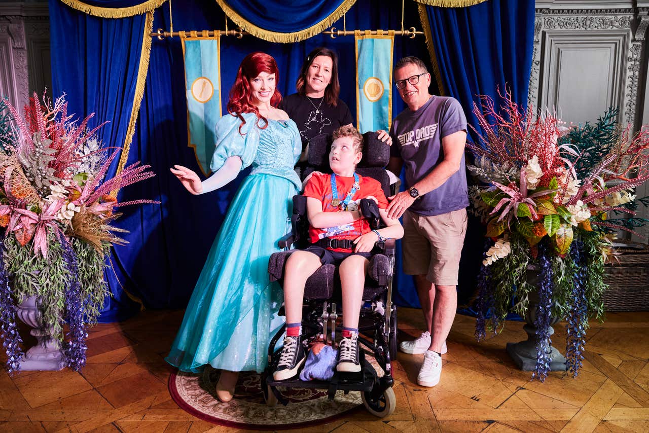 Make-A-Wish teenager meets and hugs favourite Disney characters at ...