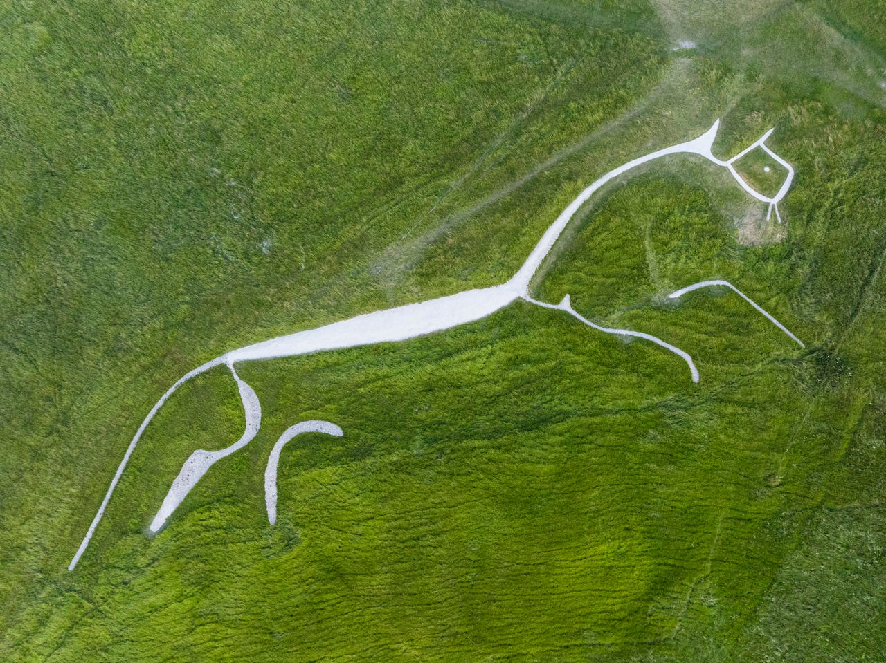 Archaeologists restore profile of Britain’s oldest chalk figure ...
