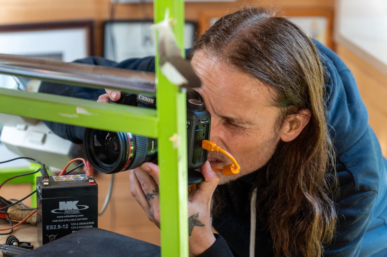 Blind photographer captures mouth and feet artists to challenge ...