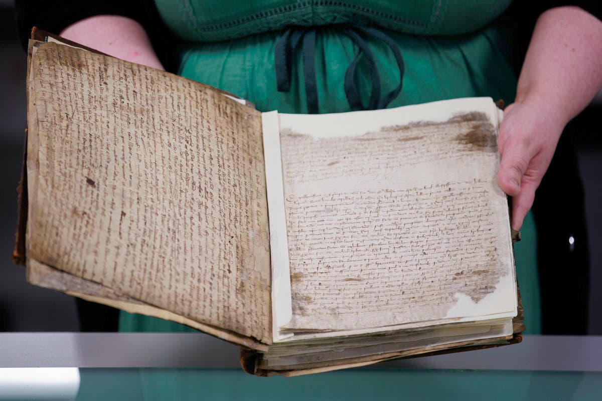 Work begins to conserve one of the oldest paper documents on island of ...
