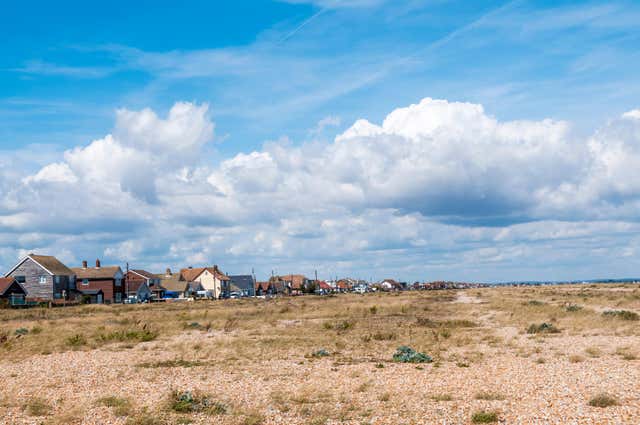 Artist faces backlash over plan to build seaside home covered in ...