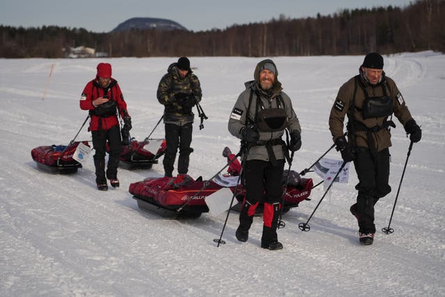 Karl Hinnett and fellow veterans complete Arctic charity challenge ...