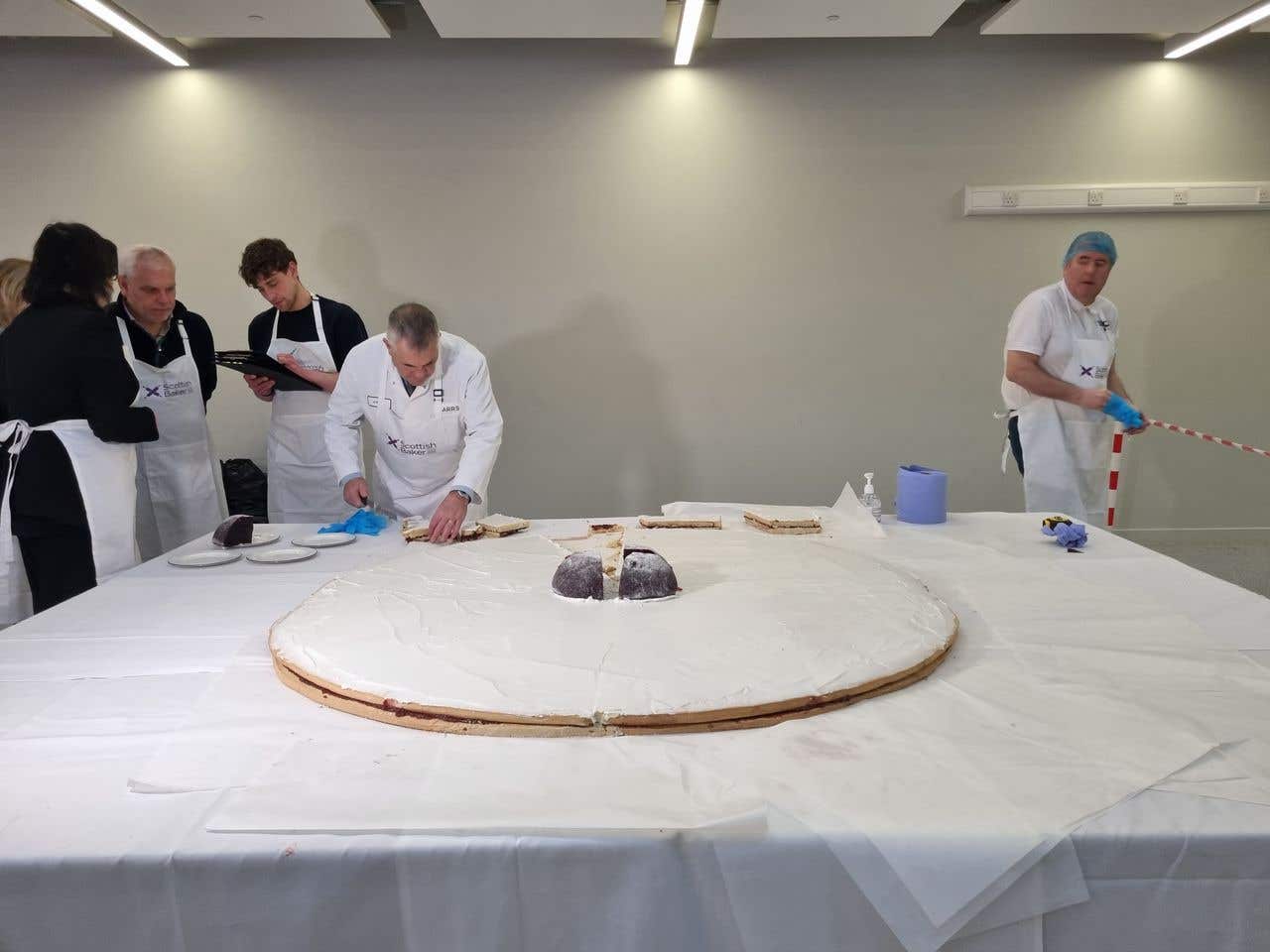 Sweet success! Bakers create largest-ever Empire biscuit to launch ...