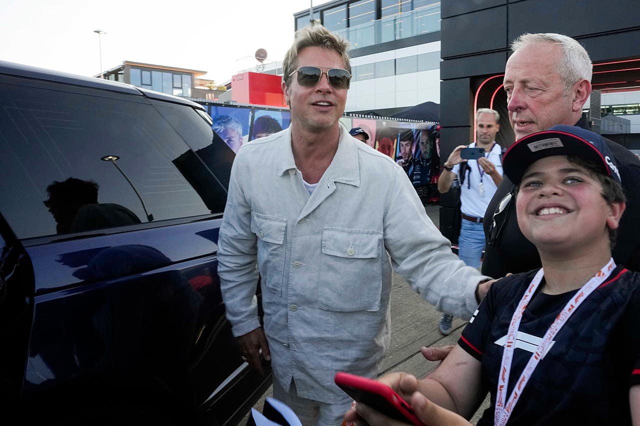 Brad Pitt cheers fans at Silverstone paddock ahead of British Grand ...