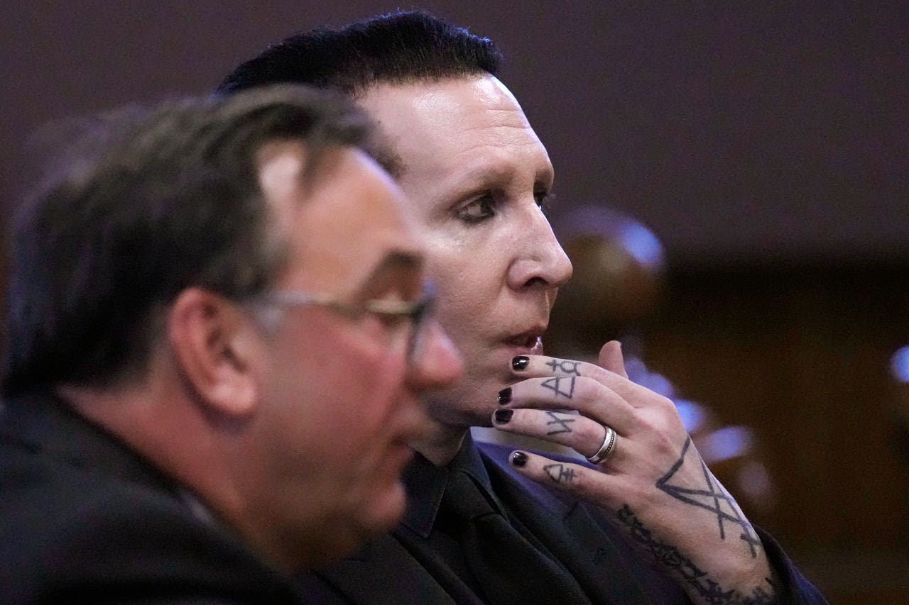 Marilyn Manson fined after pleading no contest to blowing nose on ...