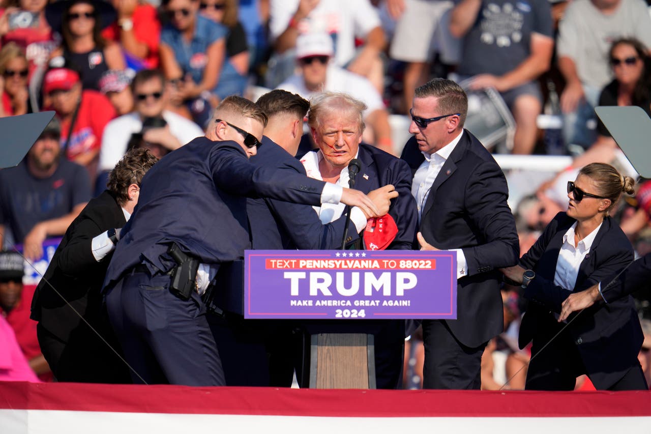 Donald Trump rushed off stage after gunshots at Pennsylvania rally | Express & Star