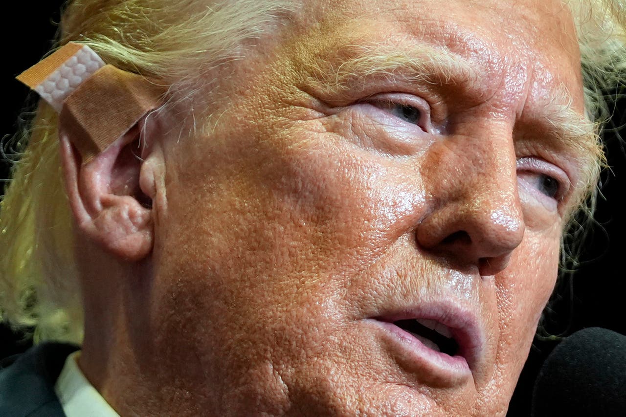 Upbeat Donald Trump returns to stage one week after assassination ...