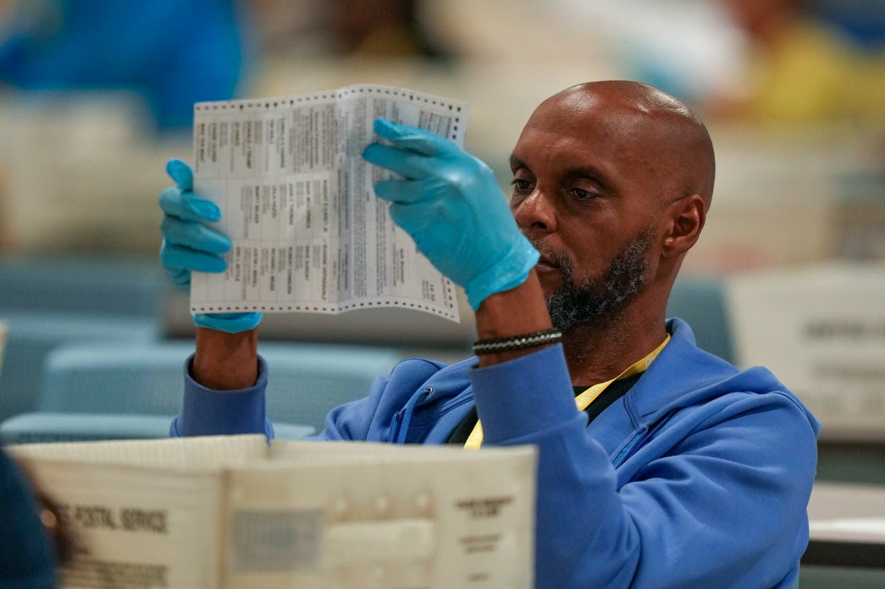 Election Day unfolds relatively smoothly despite Trump’s ...