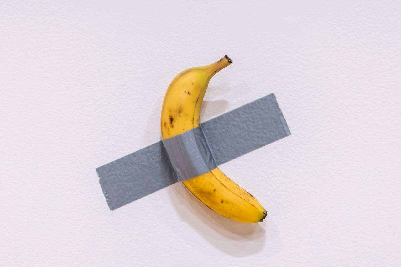 Banana taped to wall sells for 6.2m dollars at art auction | The National