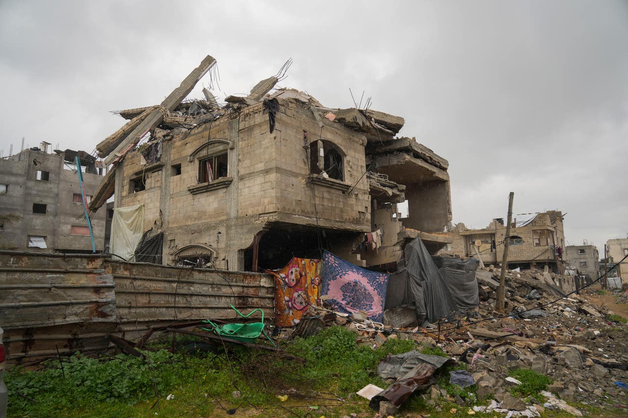 Hamas returns bodies of four hostages as Israel releases hundreds of ...