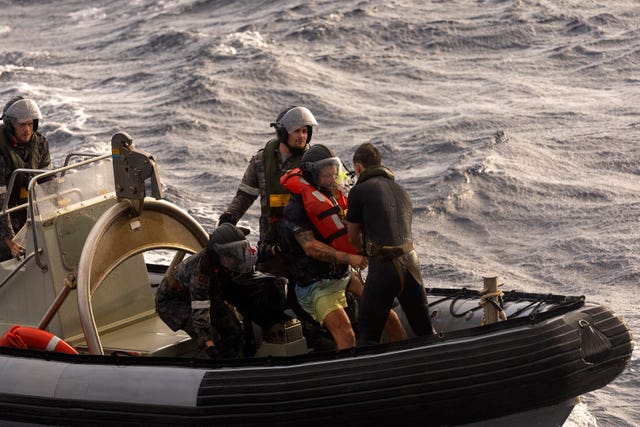 Australian Navy rescues rower as Pacific crossing hit by cyclone ...