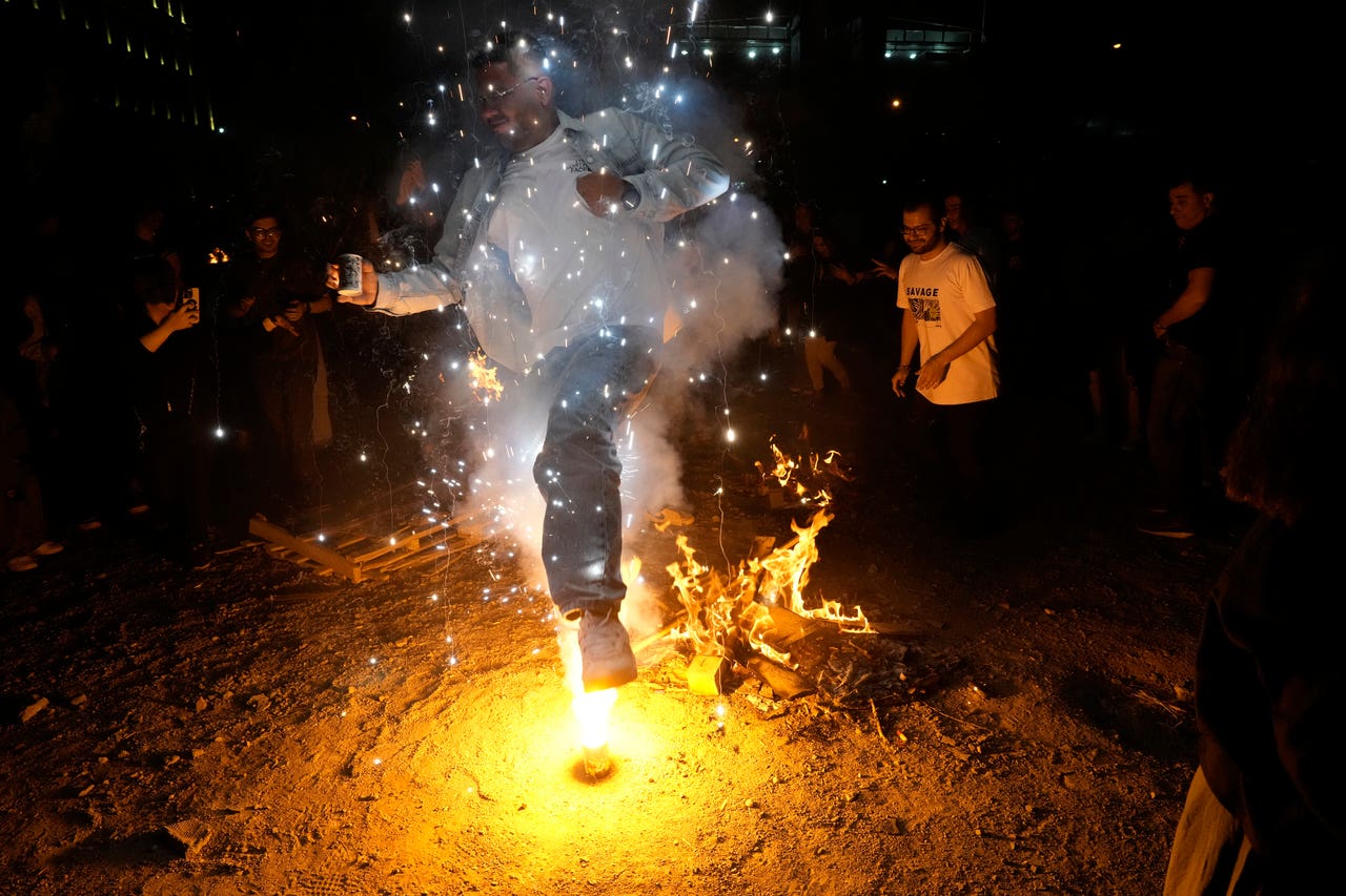 In Pictures: Iran celebrates ancient fire festival ahead of Persian New ...