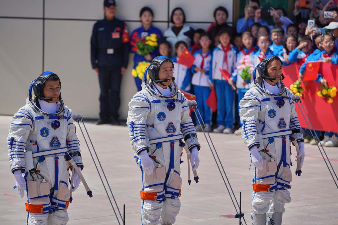 Chinese astronauts return from space station after delay blamed on ...