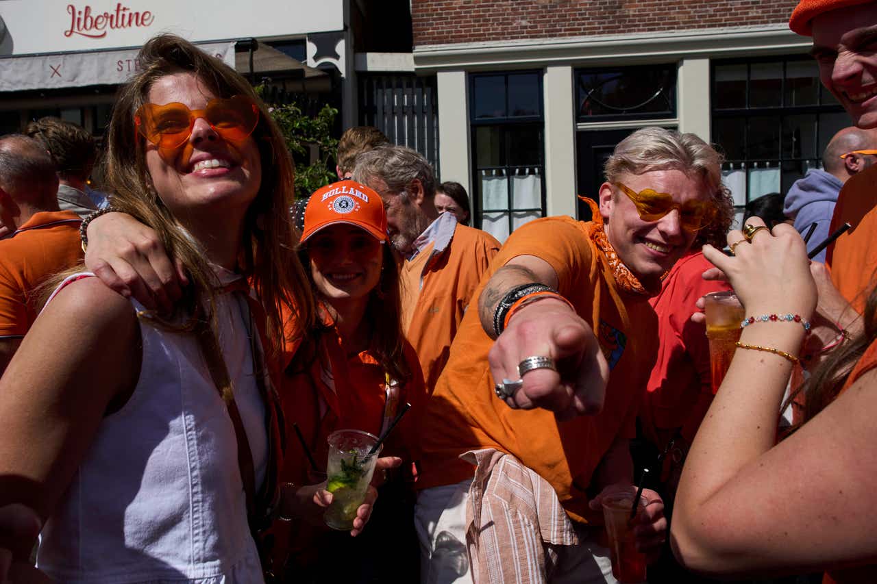 Orange-clad crowds cram into Dutch cities to celebrate king’s birthday