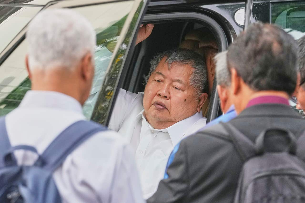 Thai construction magnate surrenders to police over building collapse ...