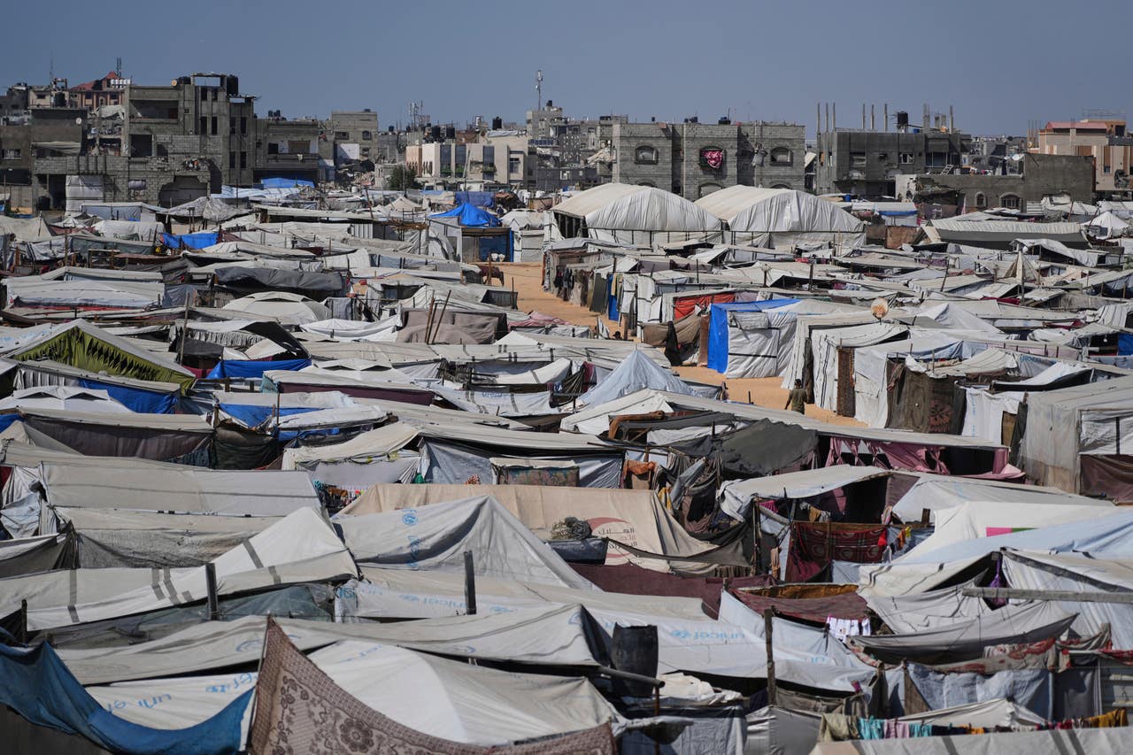 12 killed by Israeli fire near aid points, Palestinians say ...