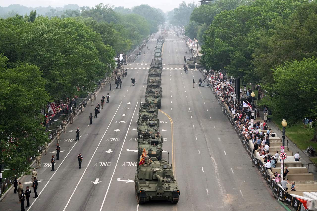 Military parade rolls through Washington as protesters across US decry ...