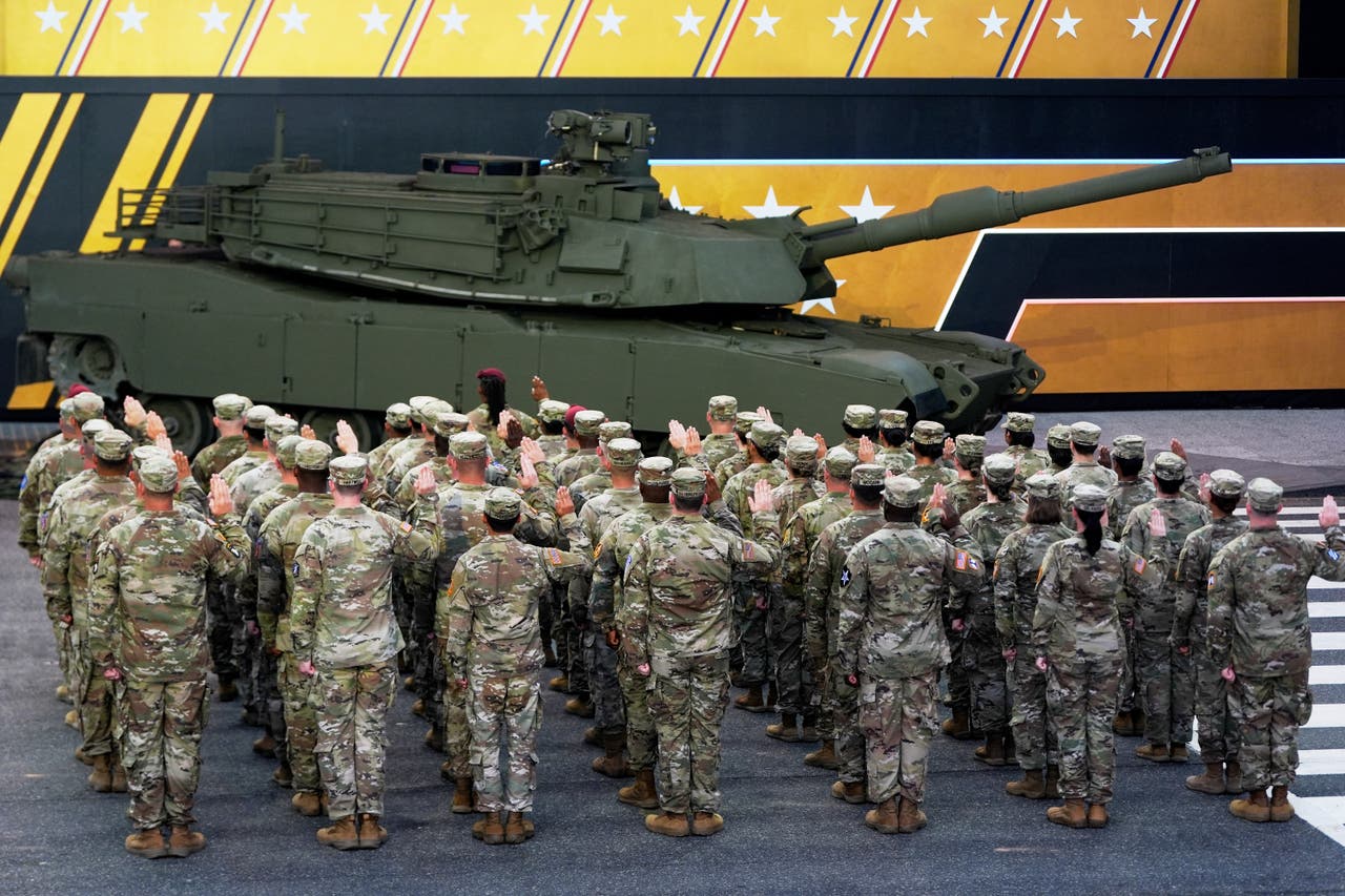 Military parade rolls through Washington as protesters across US decry ...