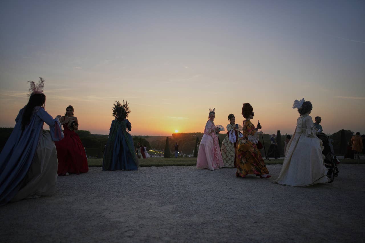 In Pictures: Revellers in baroque costumes dance until dawn at masked ...