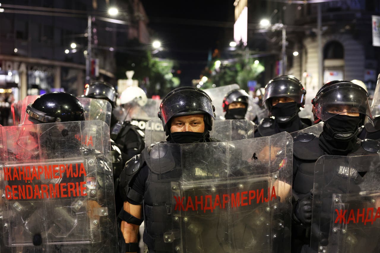 Serbian riot police fire tear gas at anti-government protesters ...