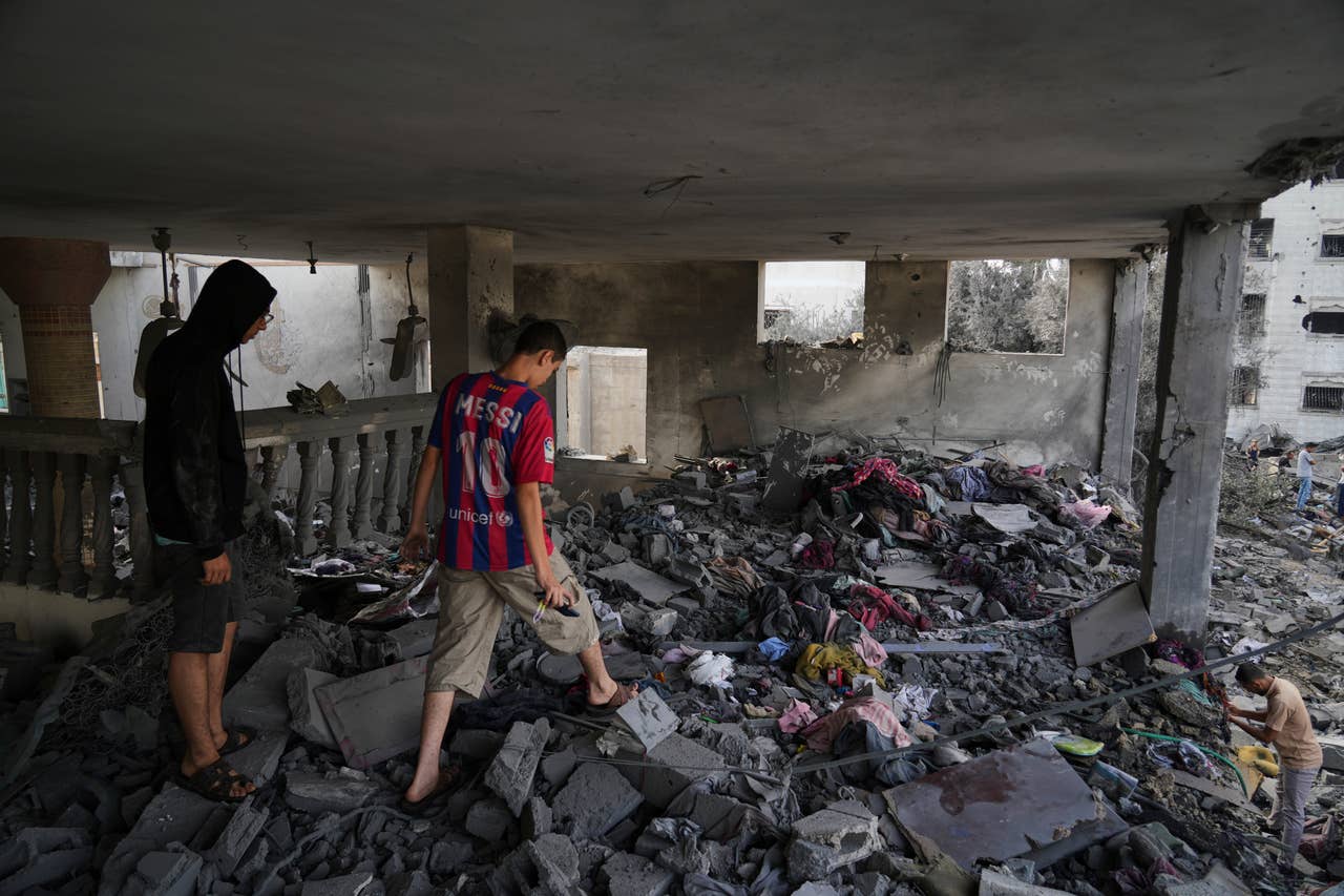 74 killed in Gaza as Israeli forces strike cafe and fire on people ...