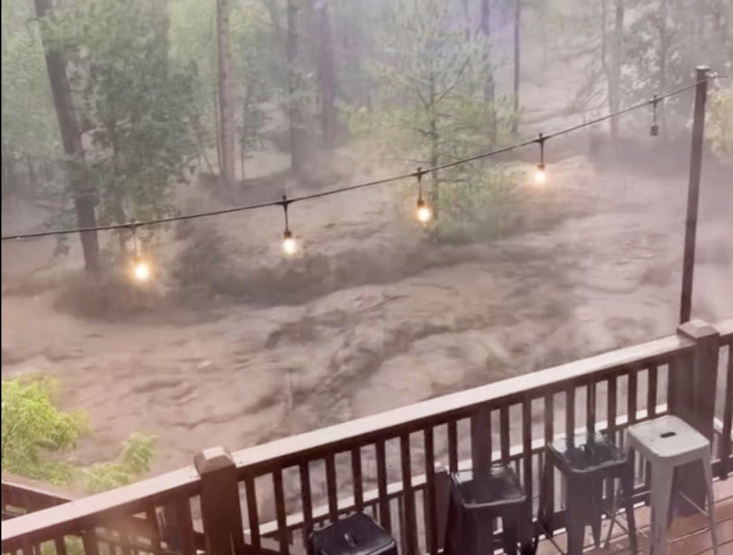Three missing and house swept away as flash flooding hits mountain ...