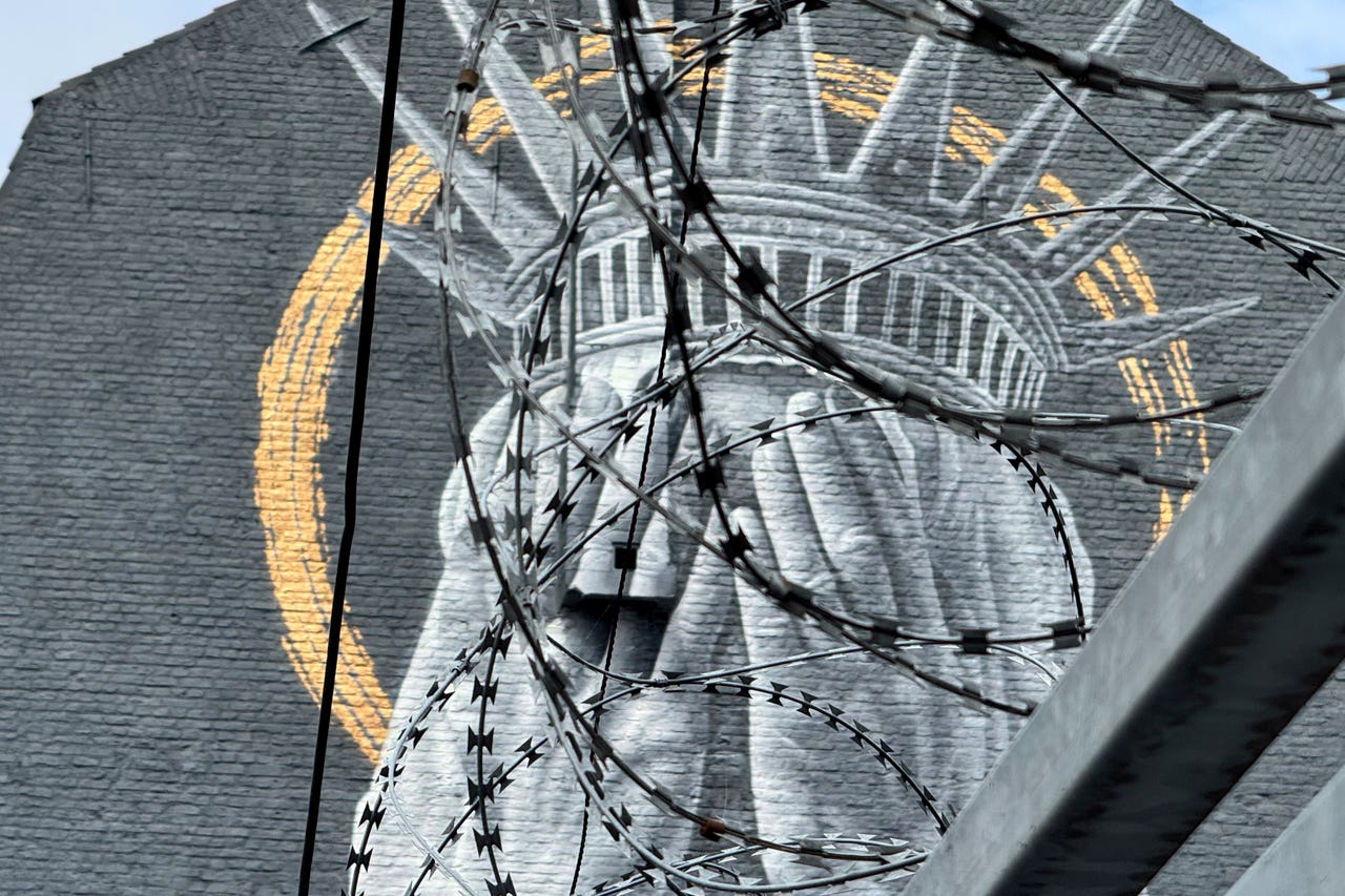 French mural shows Statue of Liberty covering her eyes in swipe at ...