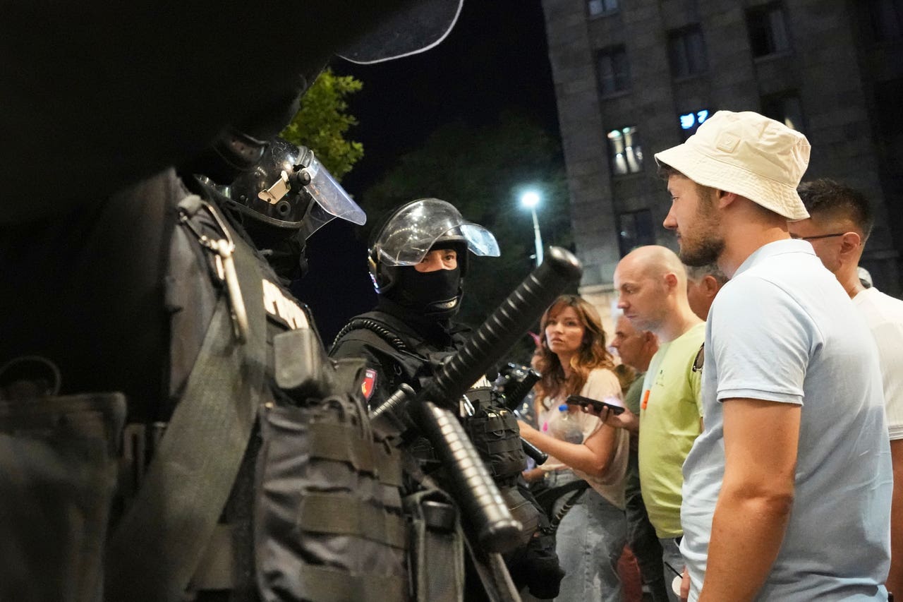 Dozens injured and detained as anti-government protests in Serbia ...