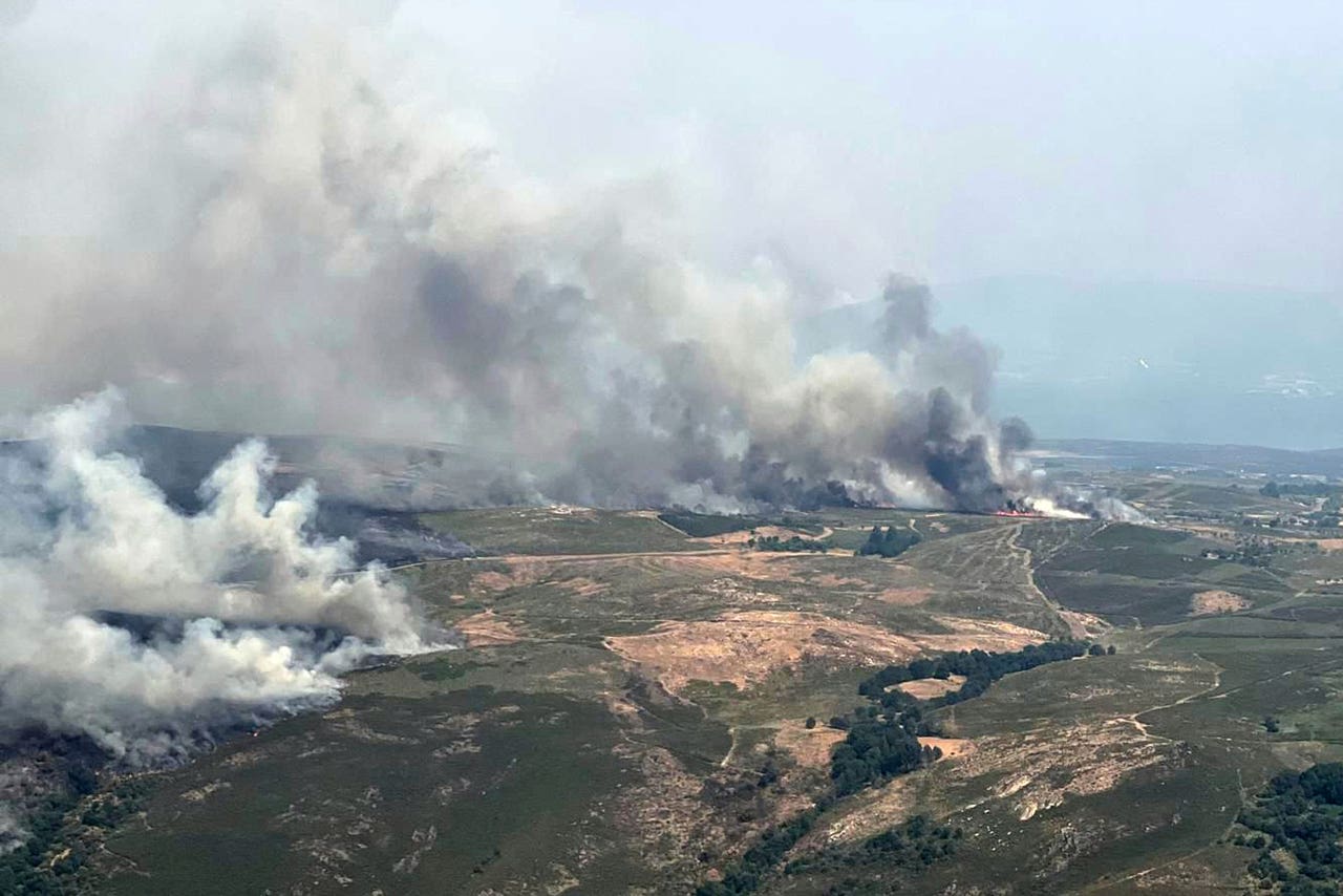 Spain, Portugal and Greece fight wildfires as heatwave expected to last ...