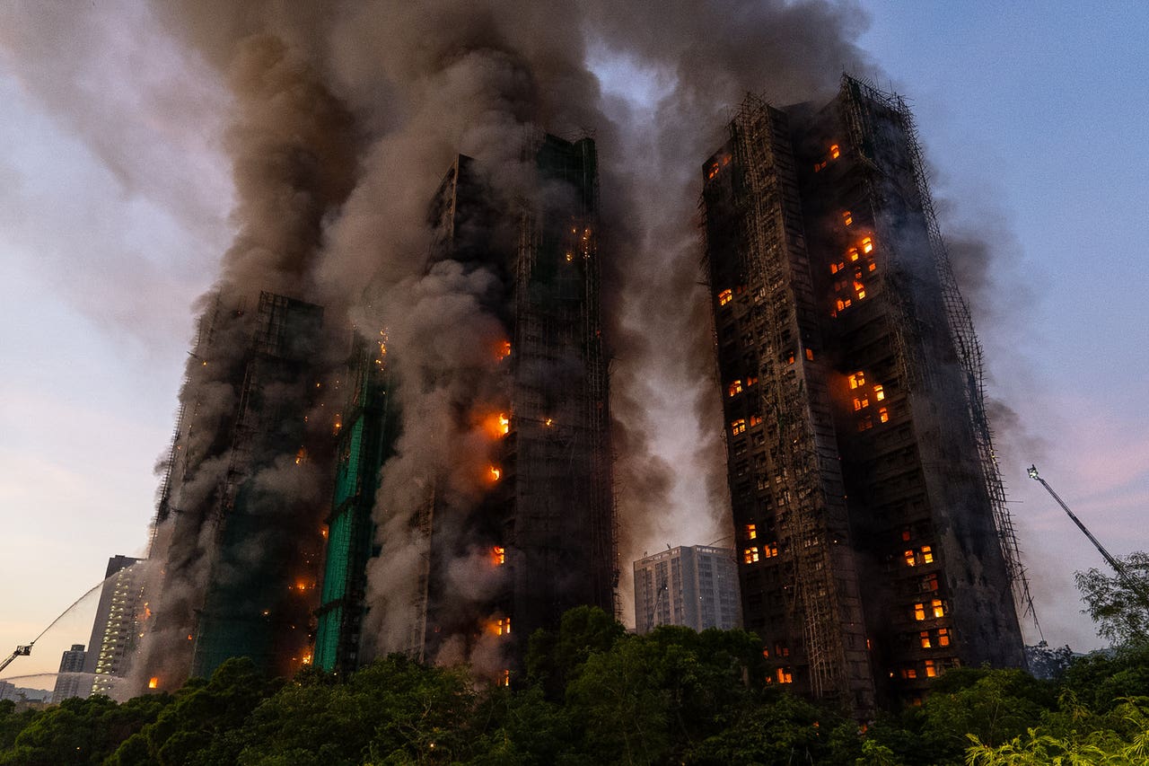 Firefighters continue to tackle deadly Hong Kong tower blaze | Herald ...