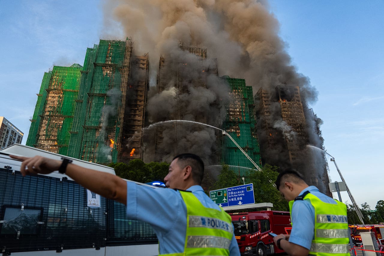 Three arrested in Hong Kong as tower blocks fire leaves at least 44 dead | Express & Star