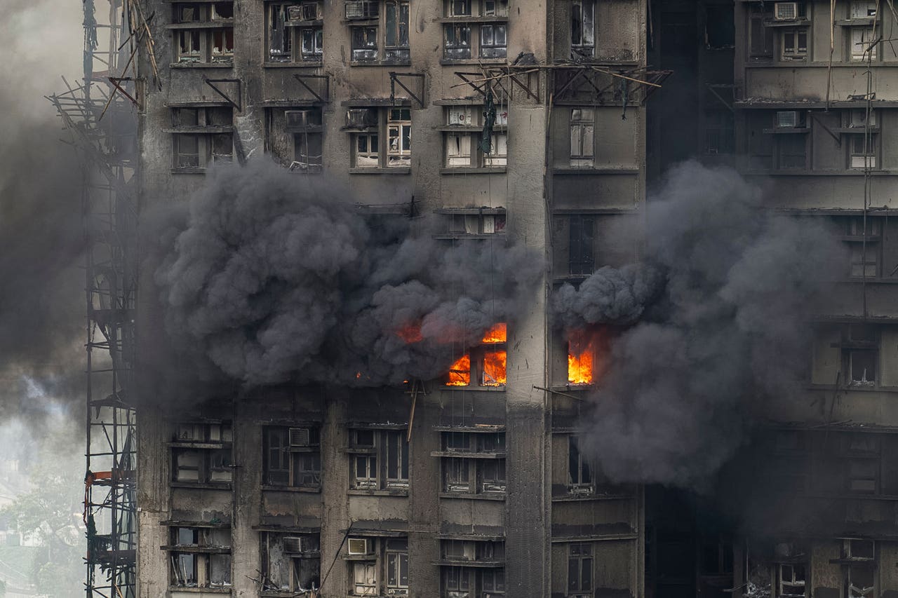 Firefighters continue to tackle deadly Hong Kong tower blaze | Slough ...