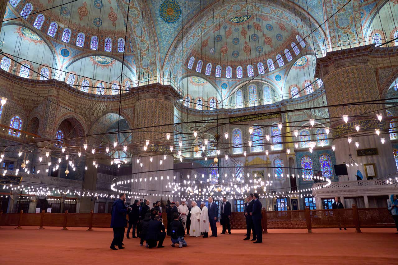 Pope visits famous Blue Mosque in Turkey as he focuses on unifying ...