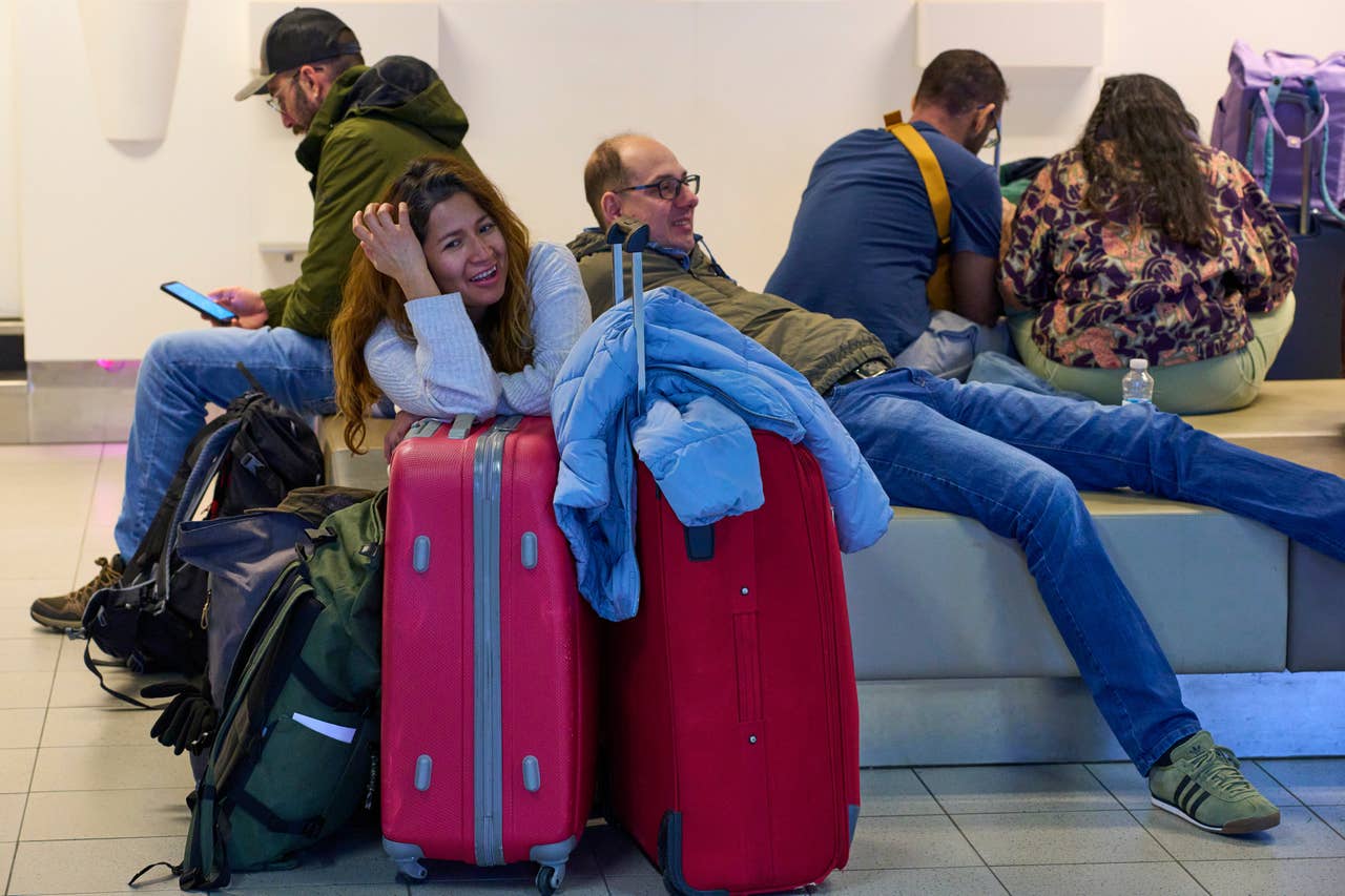 Hundreds of passengers stranded as snow and ice disrupt travel across ...