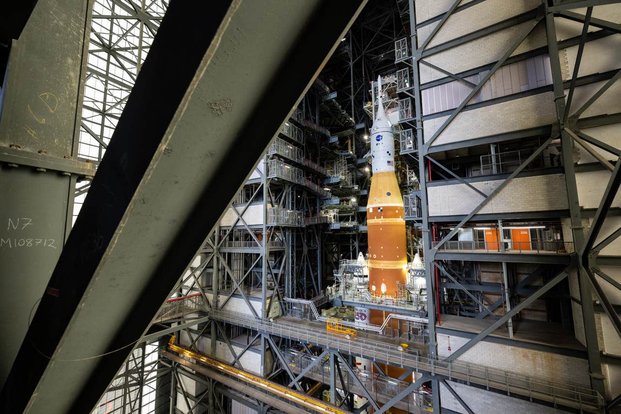 Nasa rolls out rocket for first mission in decades to take crew around ...