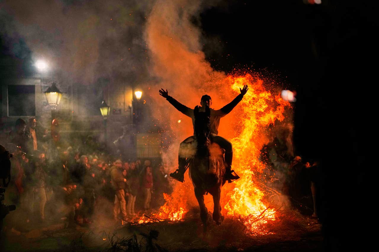 Horses leap through flames and pets blessed in honour of patron saint ...