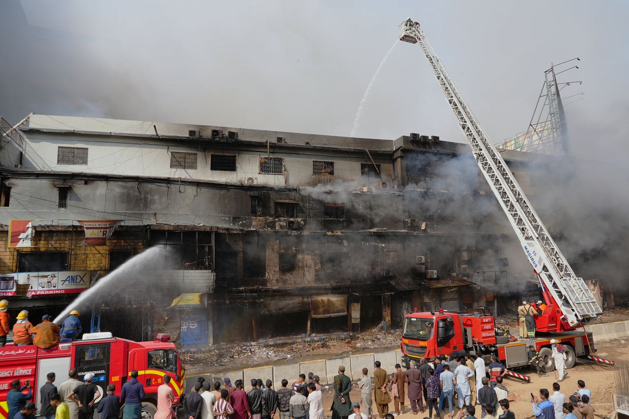 Karachi shopping plaza fire death toll rises to 11 with dozens more ...