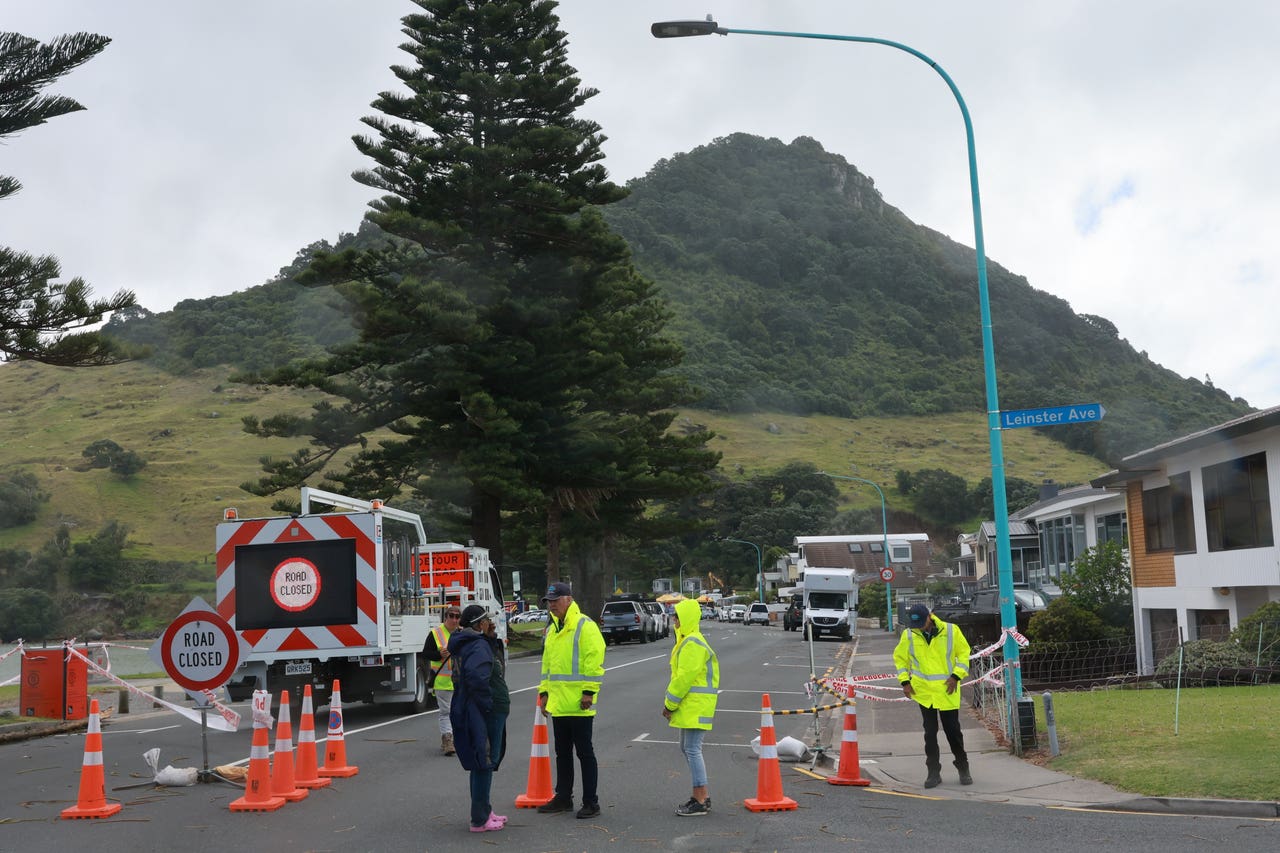 Two dead after landslides hit New Zealand campground and house ...